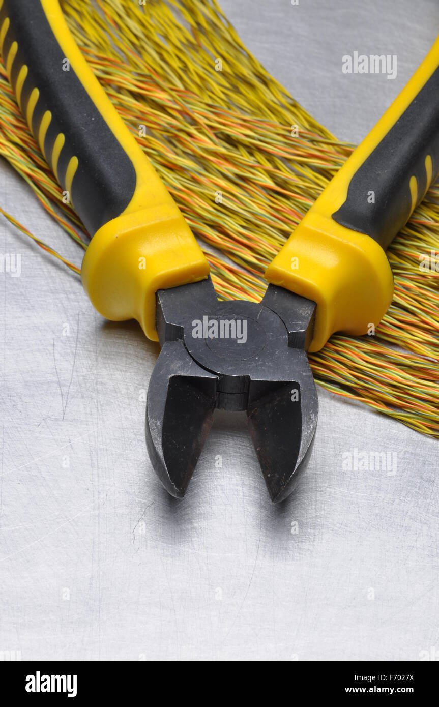 Electrical tools and cables on grey metal surface Stock Photo - Alamy