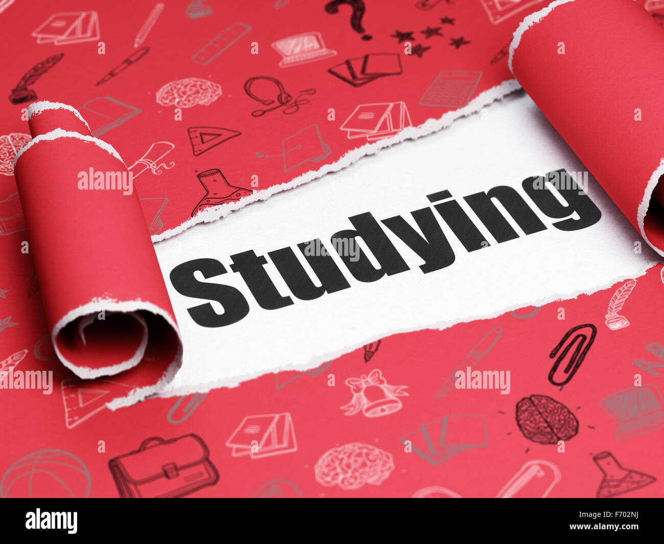 Education concept: black text Studying under the piece of torn paper ...