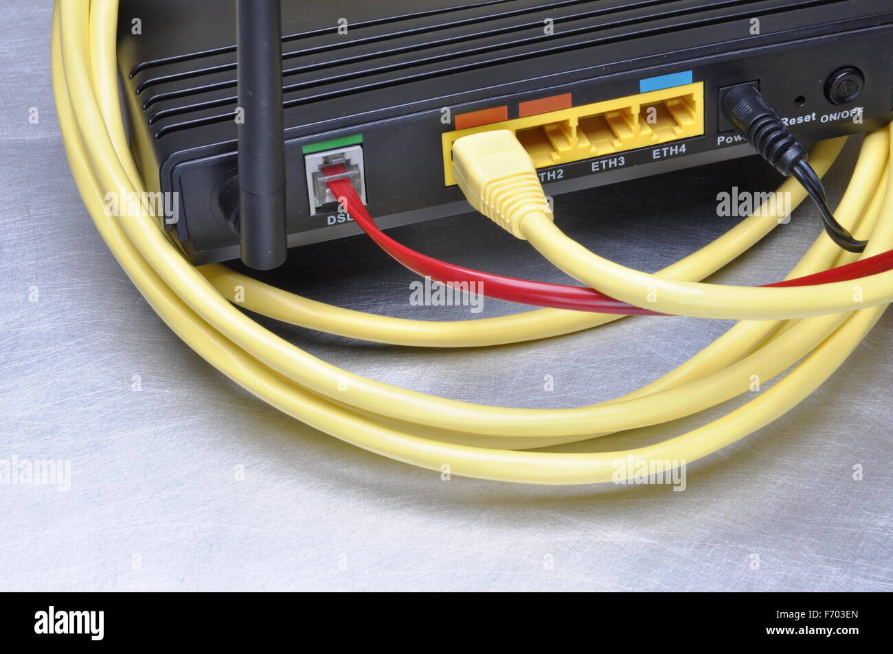 Computer network cable and internet router Stock Photo - Alamy