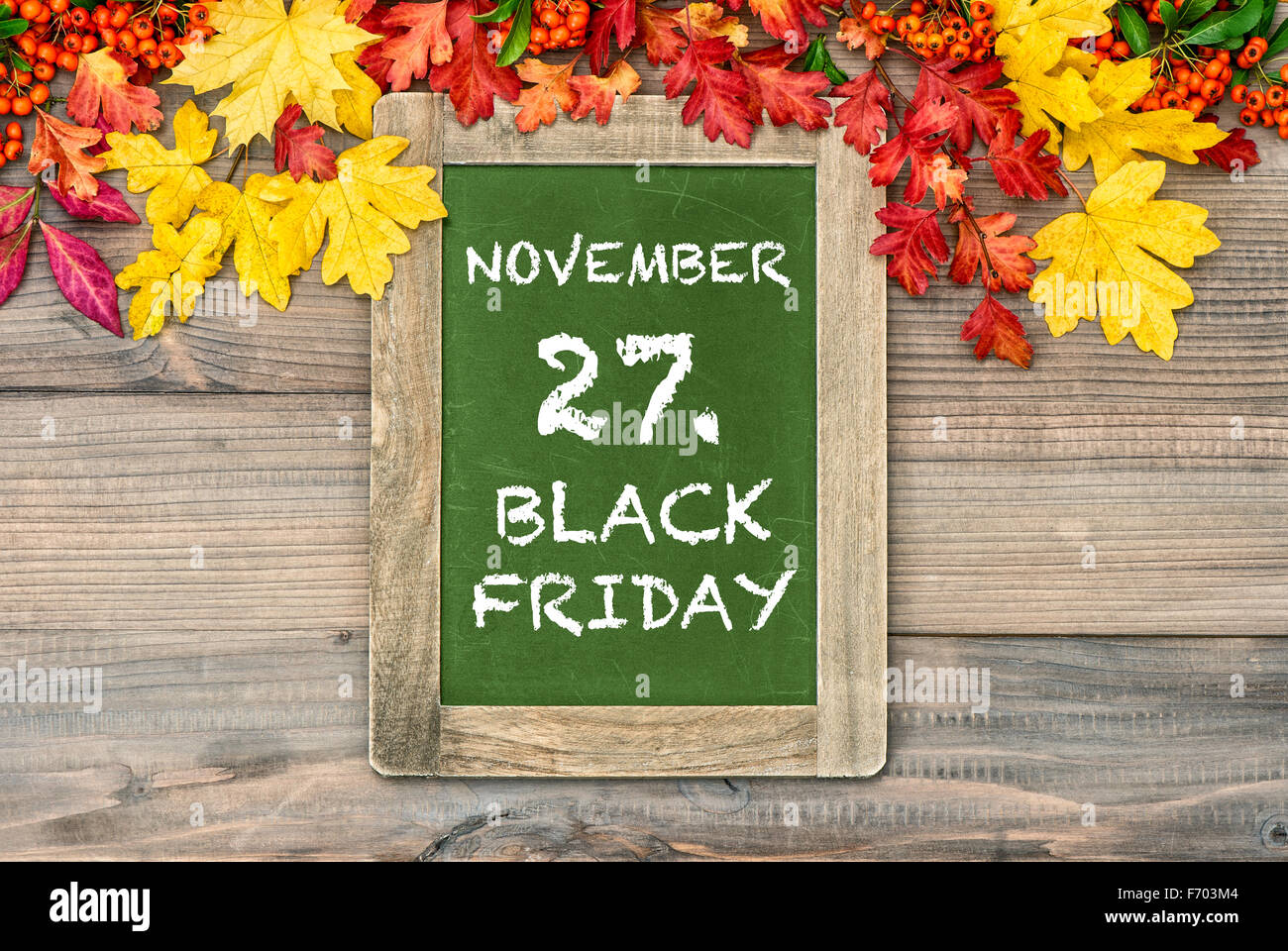 Background with colorful leaves and chalkboard. Sample text November 27 ...