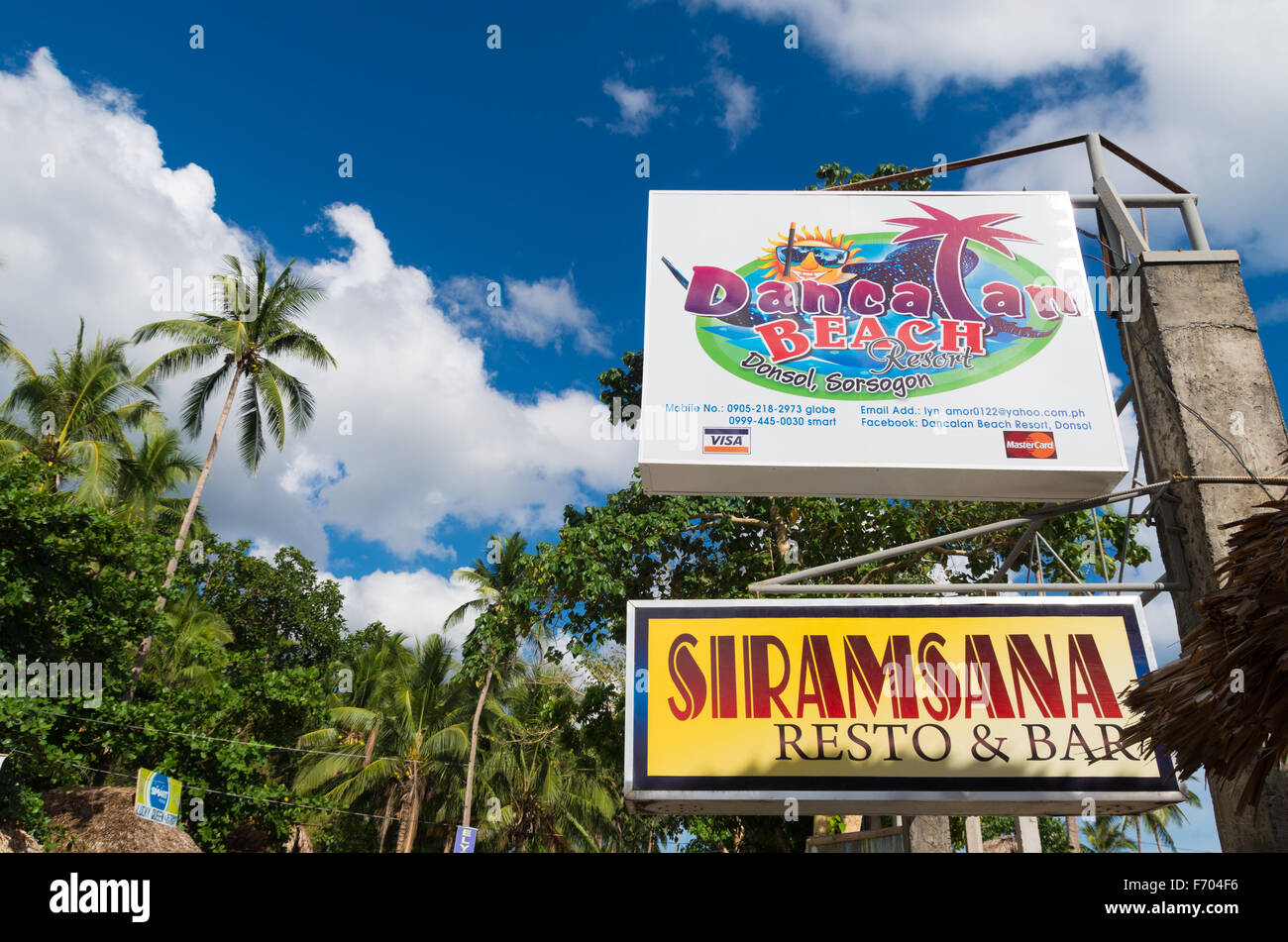 DONSOL, PHILIPPINES - JUNE 2, 2015: Sign board at a tropicall beach ...