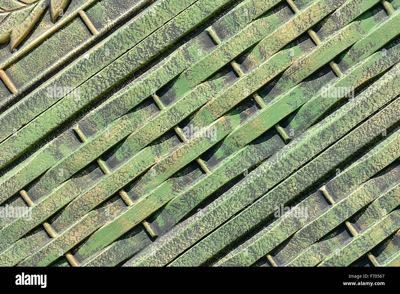 Green metal texture with patches of rust steel on its surface, taken ...