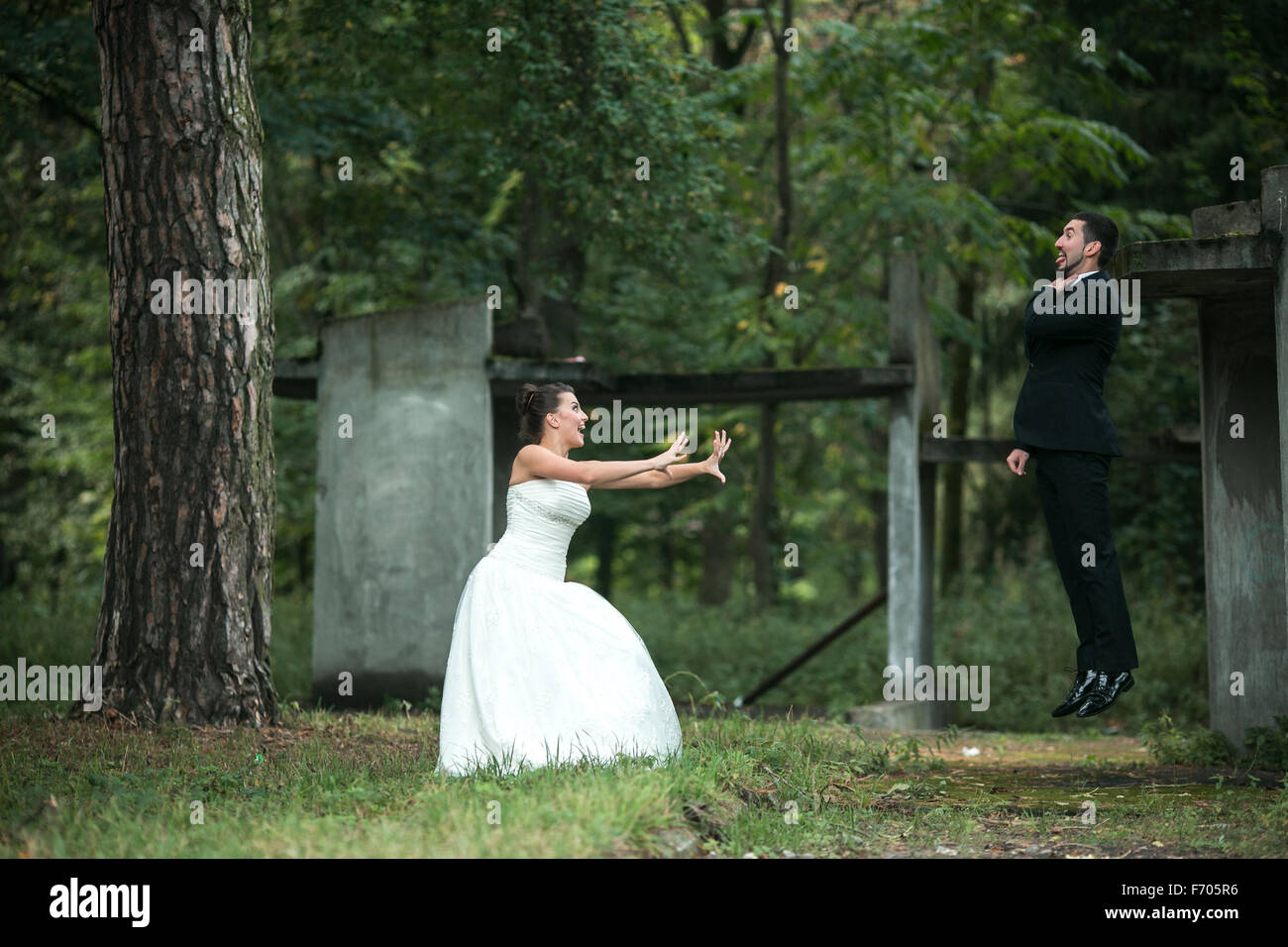 bride and groom having fun Stock Photo - Alamy