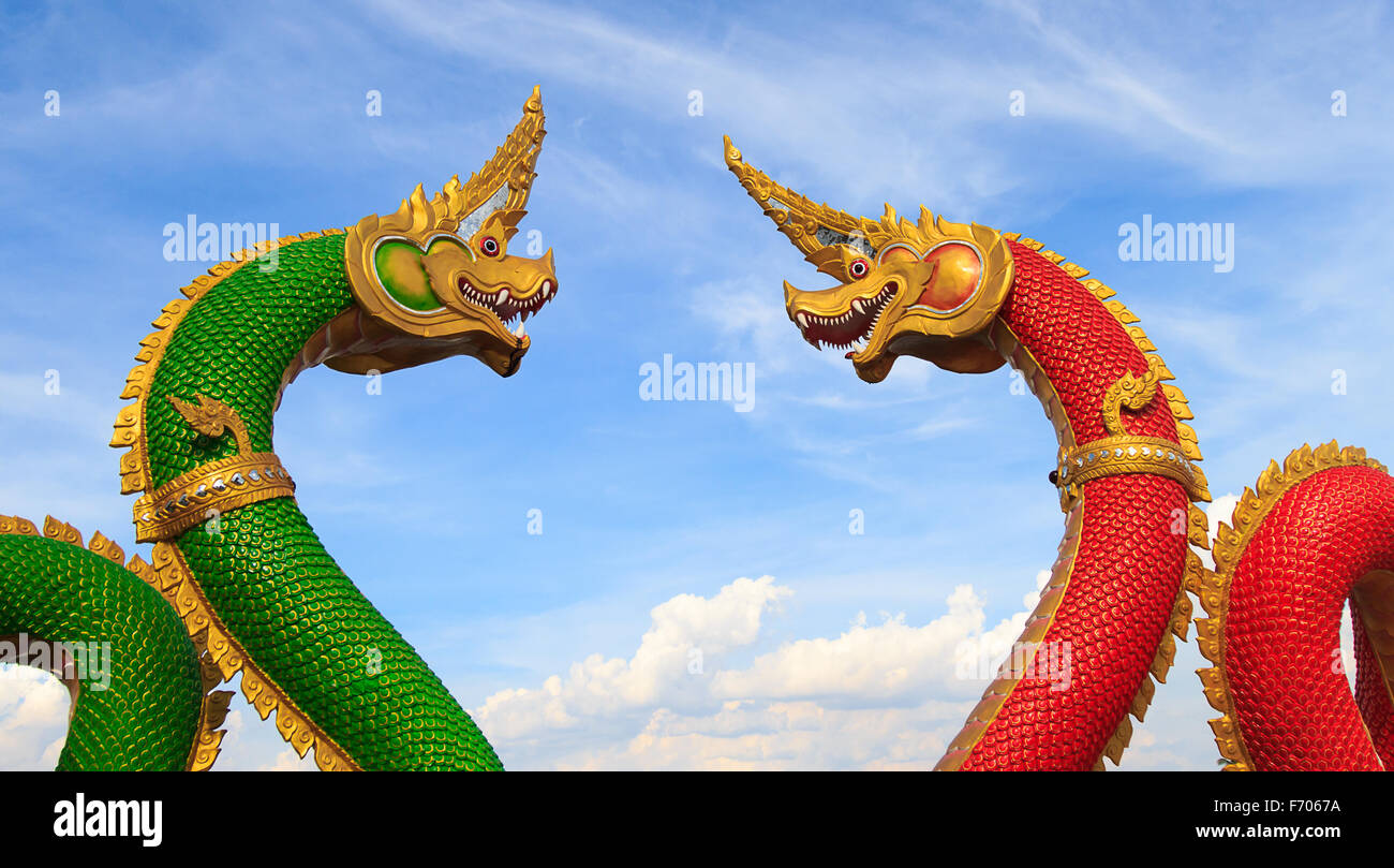 Serpent king or king of naga statue on blue sky in thailand Stock Photo ...
