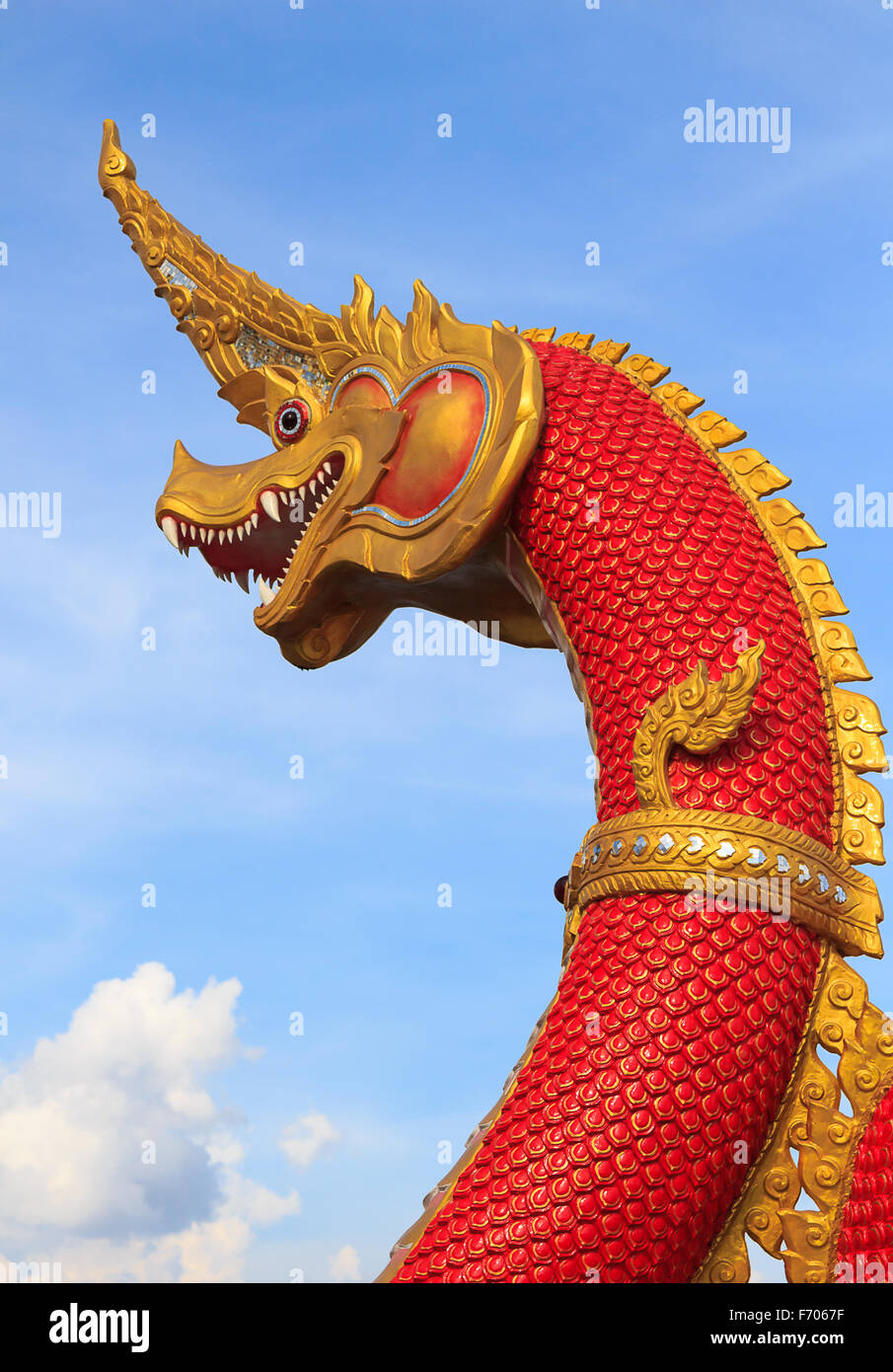Serpent king or king of naga statue on blue sky in thailand Stock Photo ...
