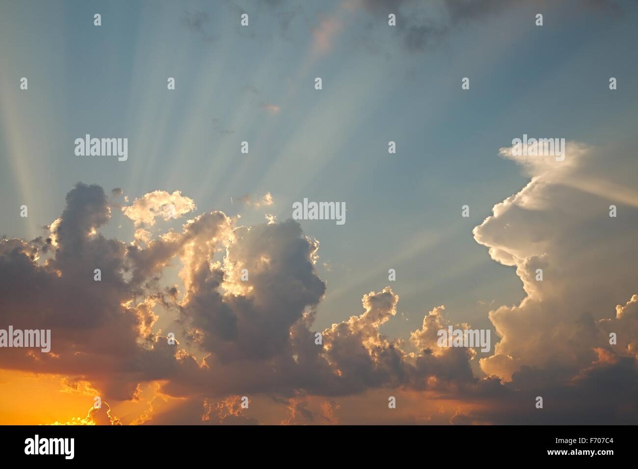 Sunset clouds and light rays Stock Photo - Alamy