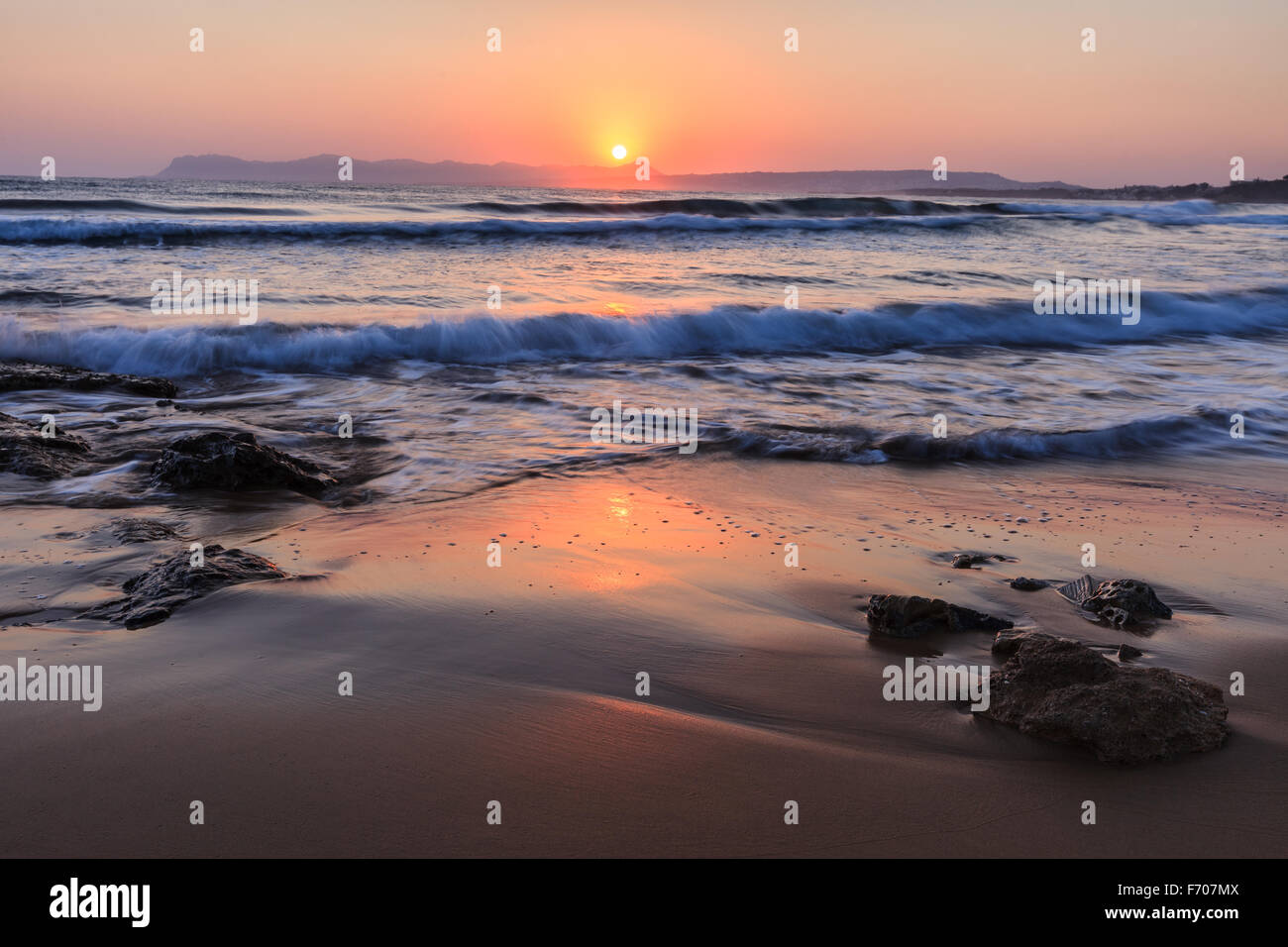 sunrise on the beach Stock Photo - Alamy