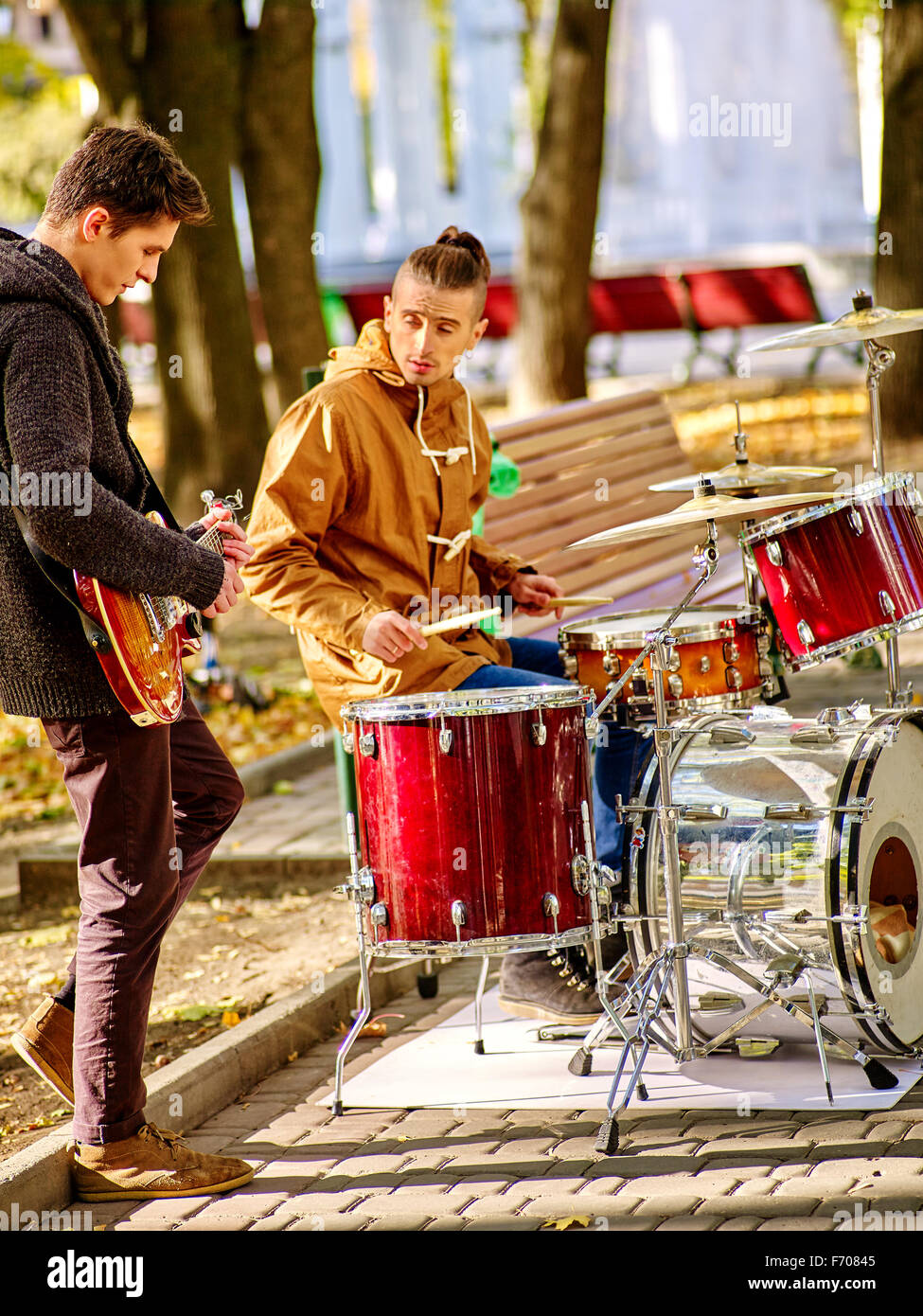Male performance of street musicians Stock Photo - Alamy