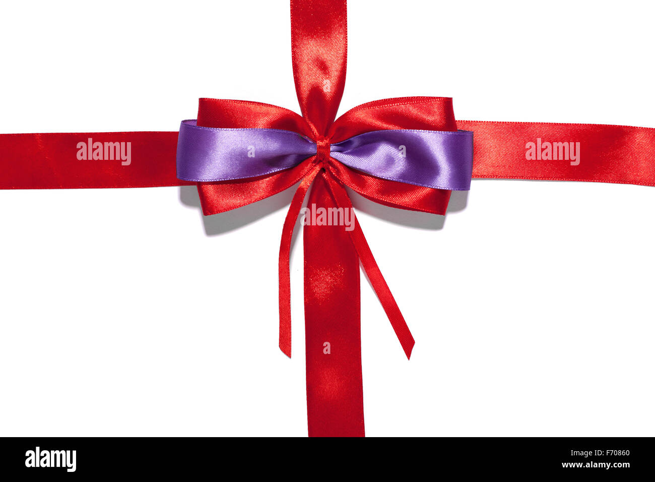 Red ribbon bow on white background Stock Photo - Alamy