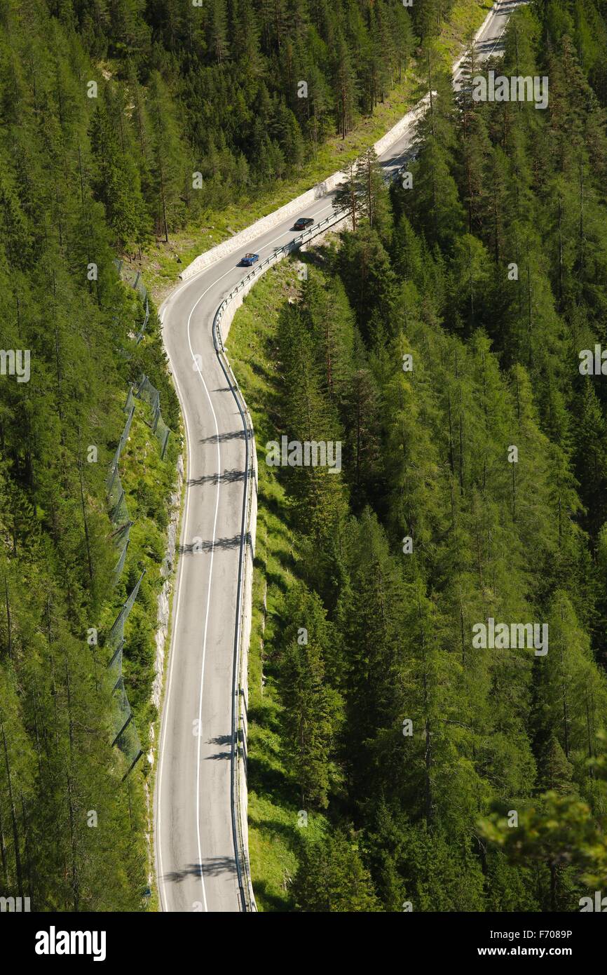 Steep mountain road with green hills and car hi-res stock photography ...