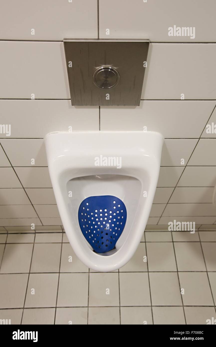 Urinal of a restroom Stock Photo - Alamy
