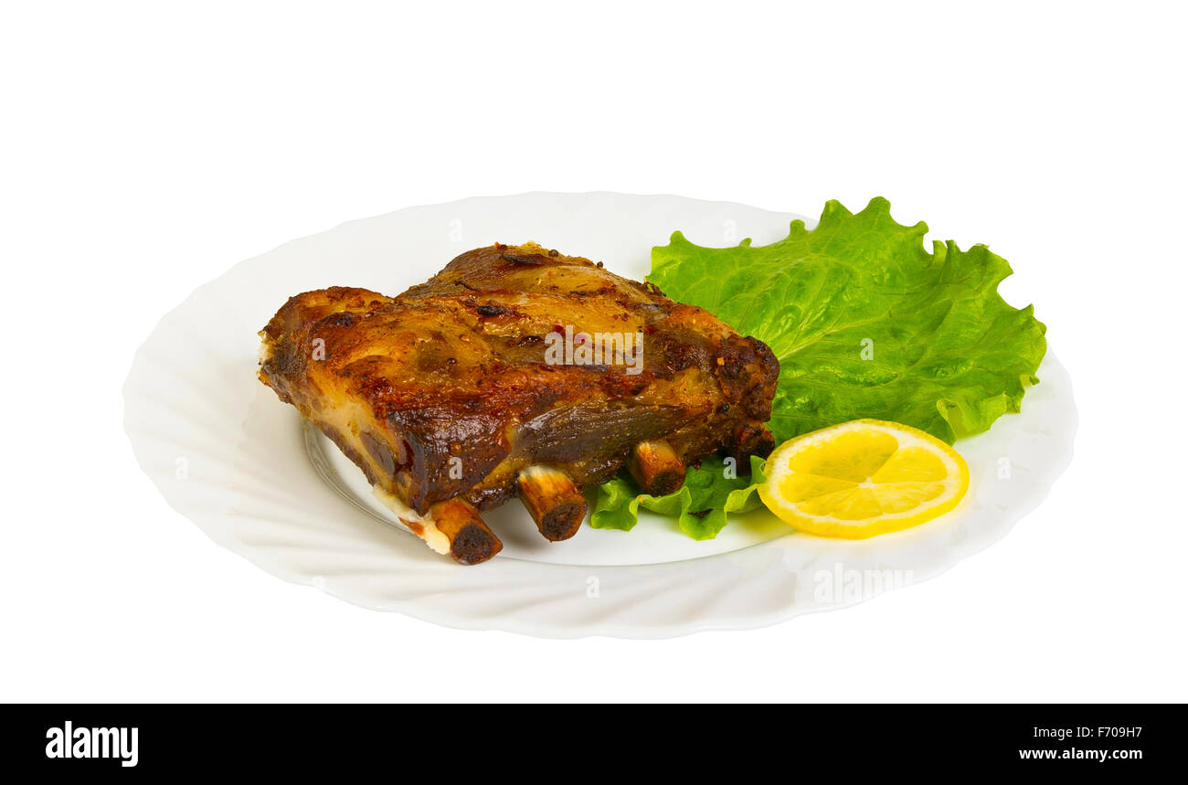 The ribs of wild boar grill on the plate, isolated on white background ...