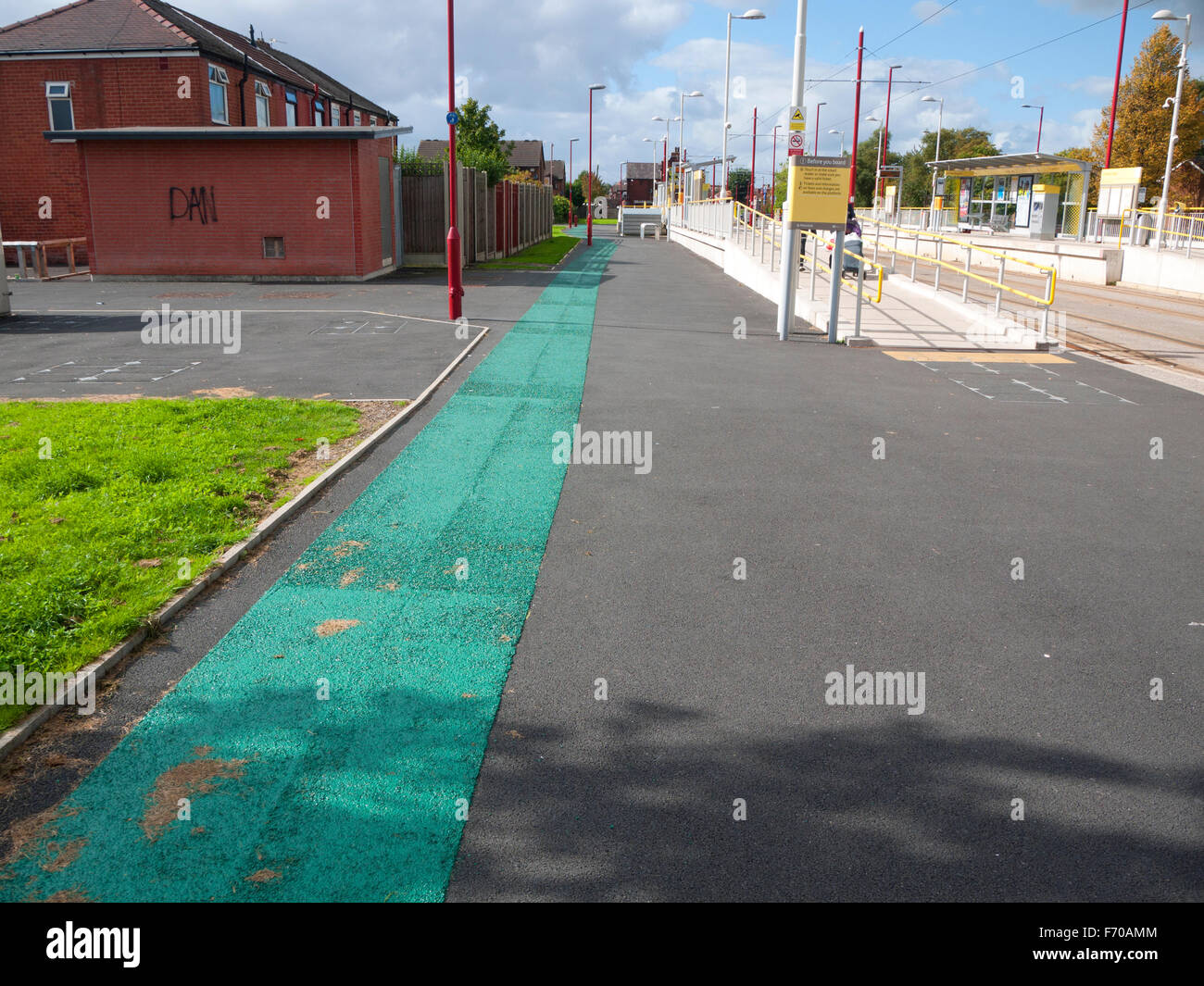 Green marked cycle route alongside the Cemetery Road tram stop ...