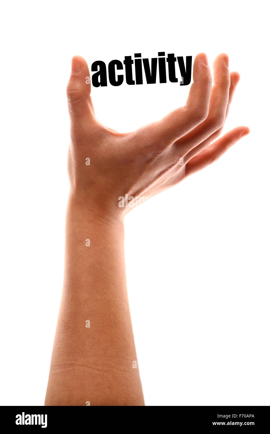 Color vertical shot of a of a hand squeezing the word "activity Stock ...