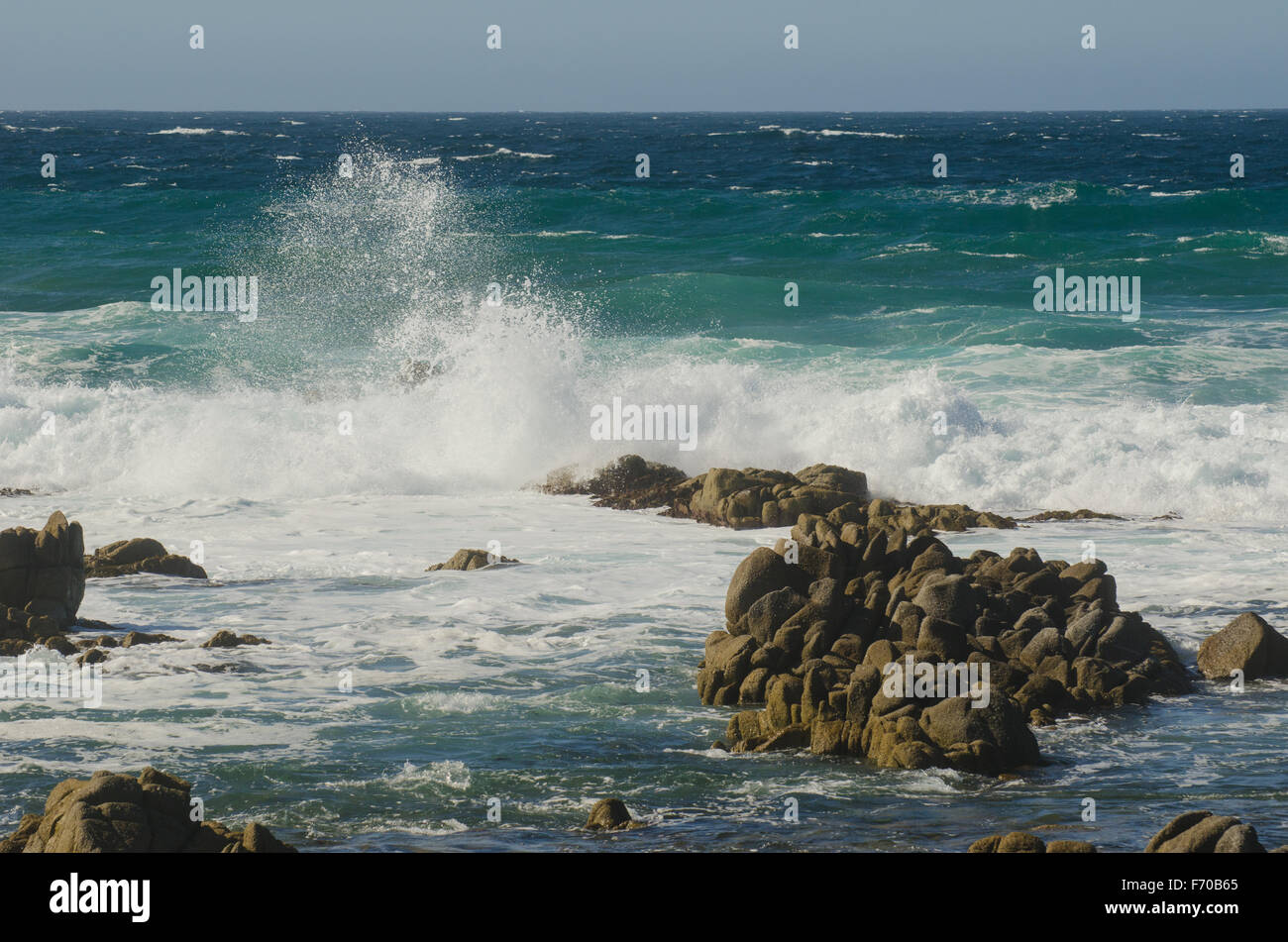 Waves breaking over rocks on Asilomar beach, Pacific Grove California ...
