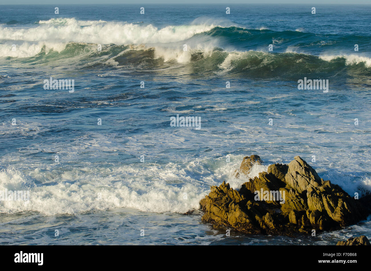 Waves breaking over rocks on Asilomar beach, Pacific Grove California ...