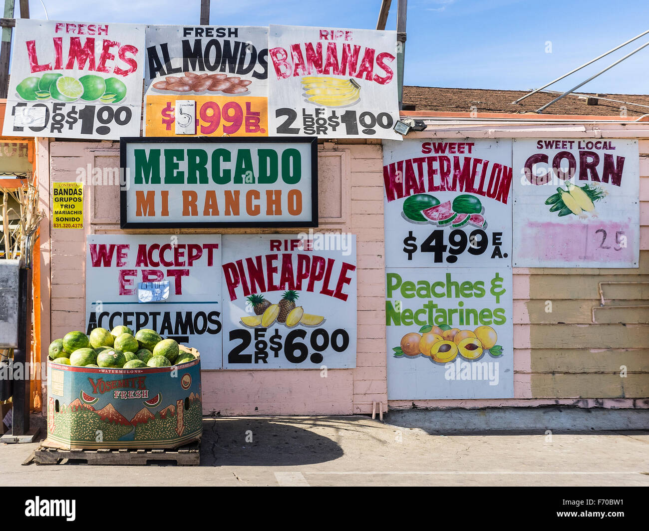Colorful market signs on the side of the building advertising the ...
