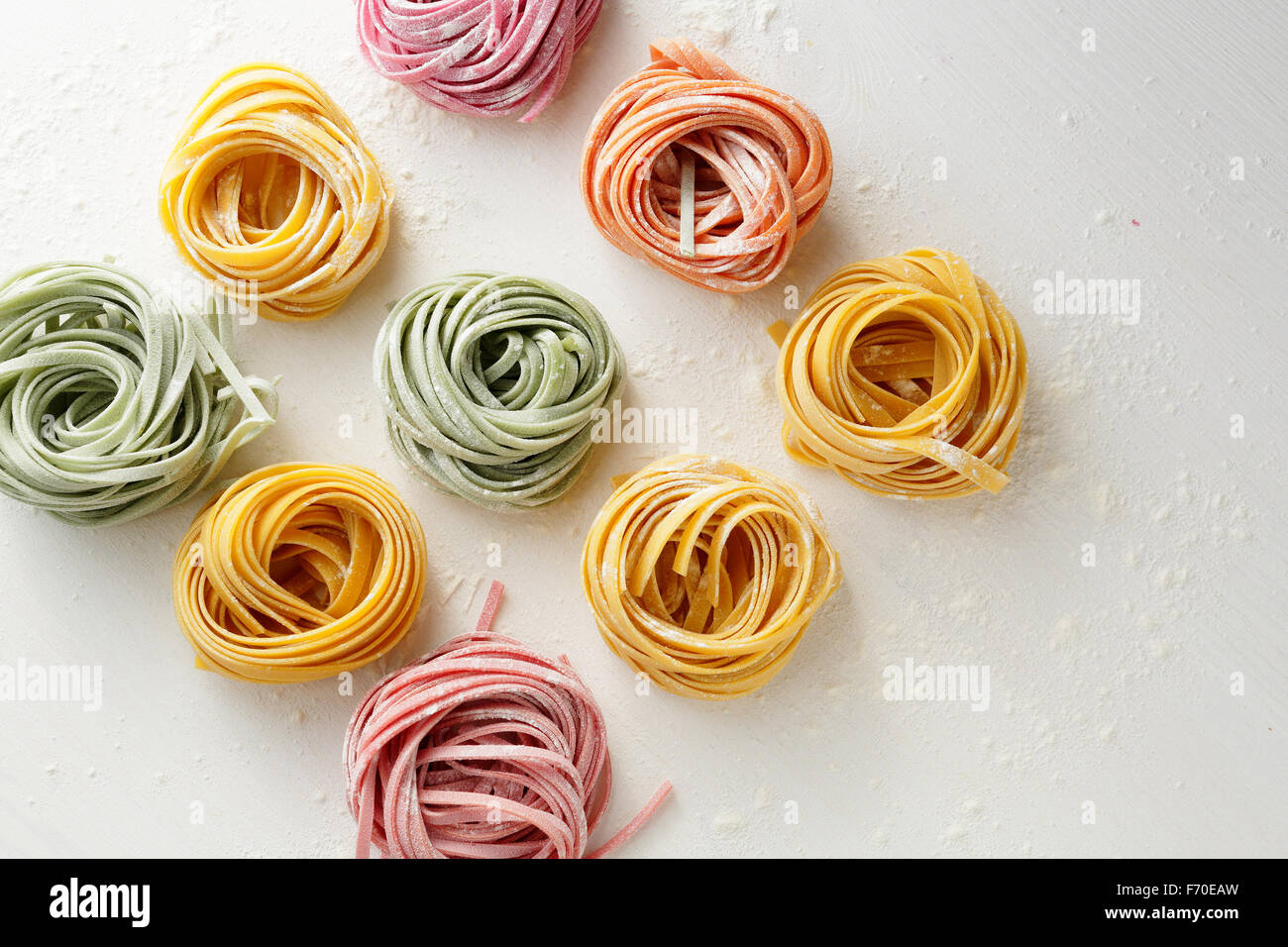 raw pasta on white background, food top view Stock Photo - Alamy