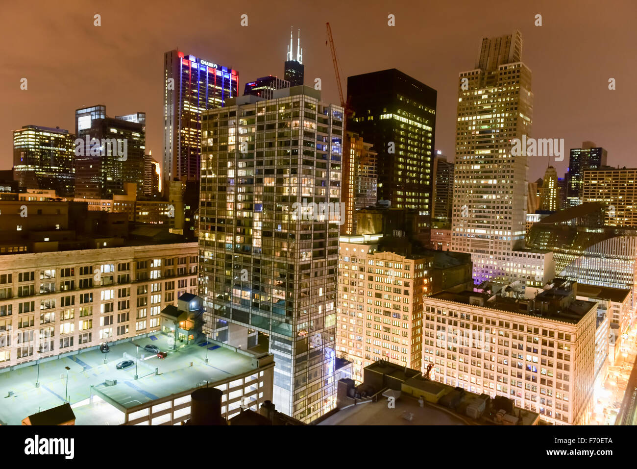 Chicago urban skyscrapers illuminated with lights at night Stock Photo ...