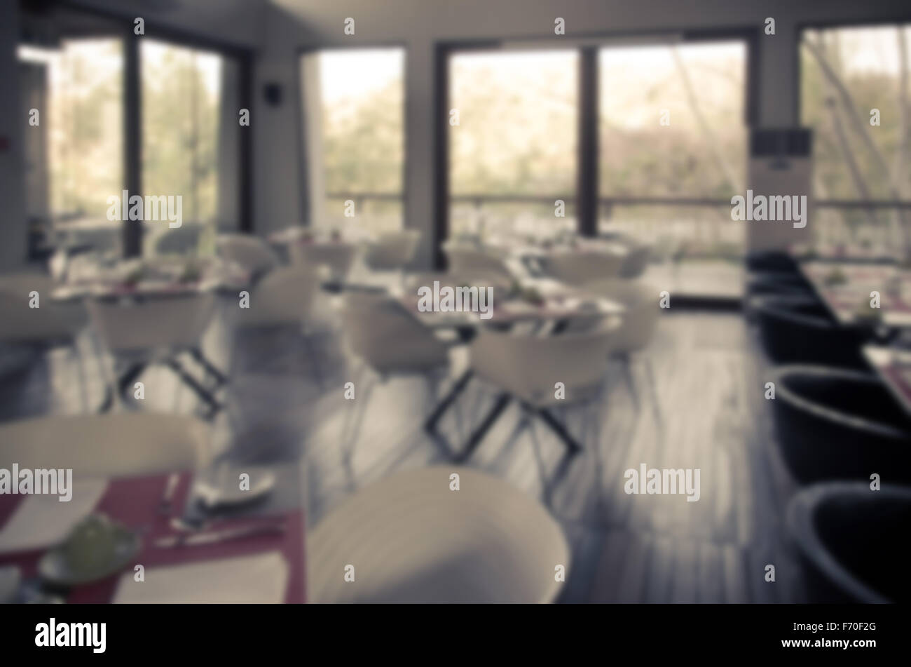 Blurred background : restaurant table blur background Stock Photo - Alamy