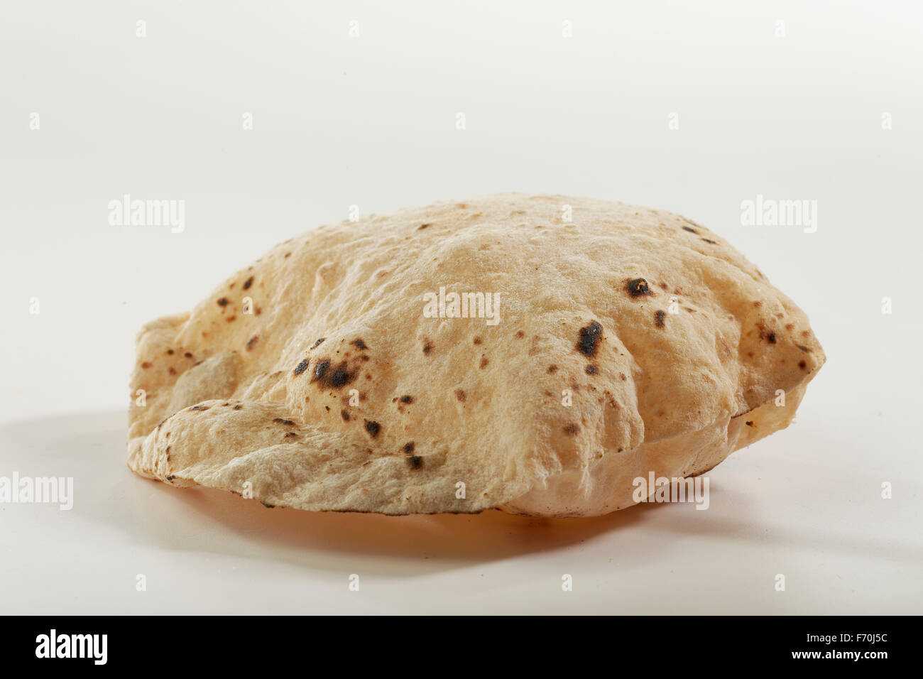 Phulka a kind of Chapati: home made Indian thin bread on white ...