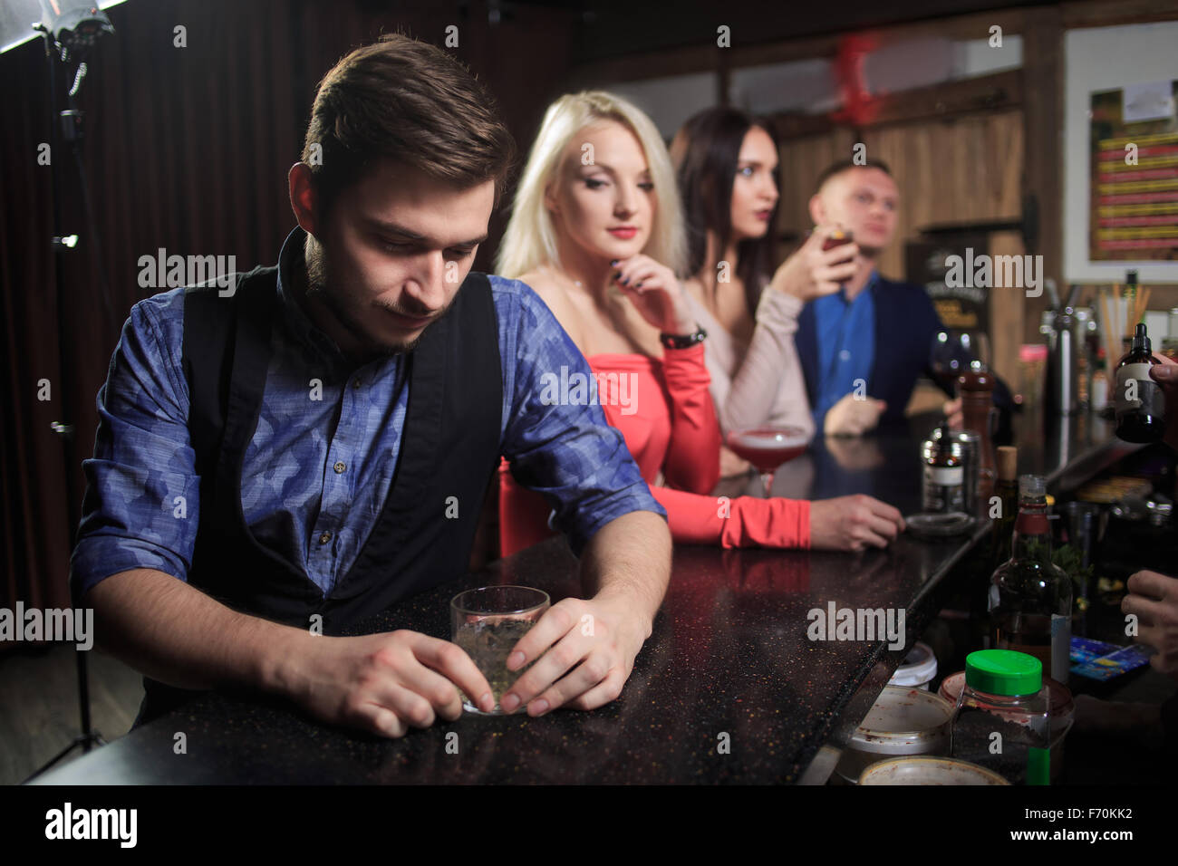 People in the bar. night club. sparklers Stock Photo - Alamy