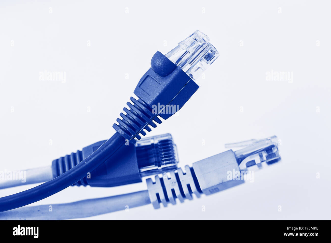 shallow DOF blue network cable with connectors Stock Photo - Alamy