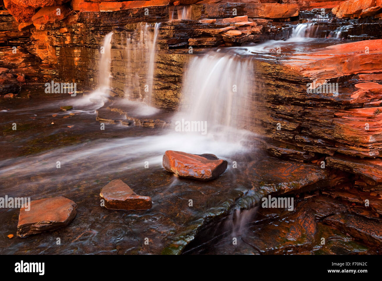 A small waterfall in the Hancock Gorge in Karijini National Park ...