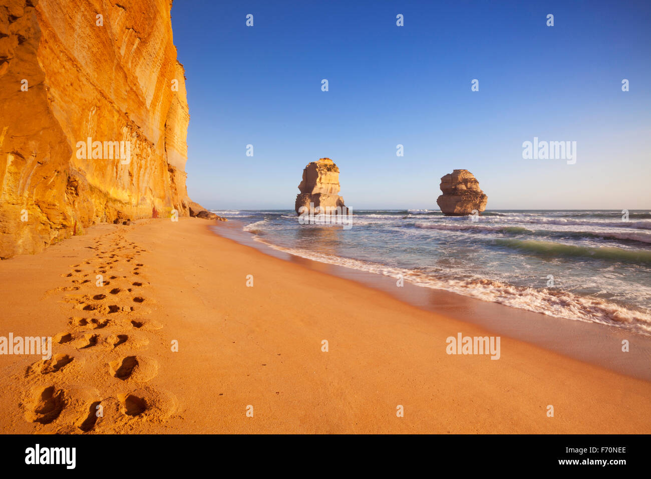 Footsteps on the beach at the Twelve Apostles along the Great Ocean ...