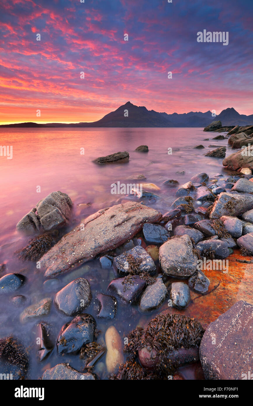 The beach of Elgol on the Isle of Skye, Scotland with The Cuillins in ...
