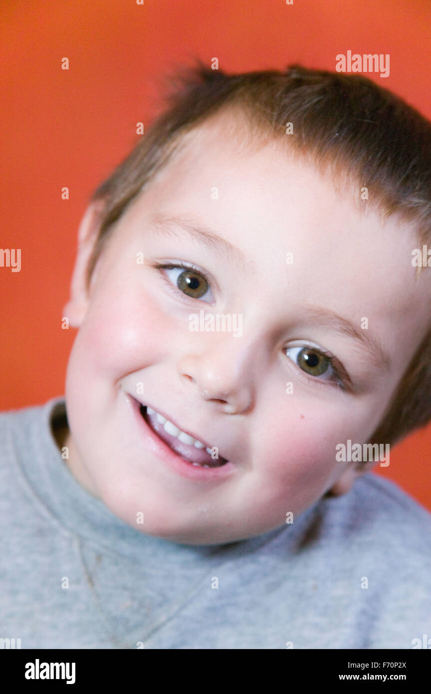 Portrait of a little boy smiling Stock Photo - Alamy