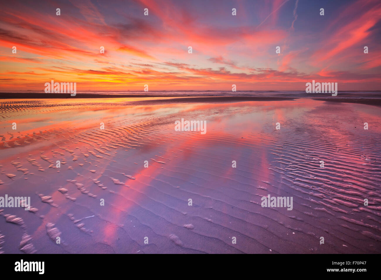 Reflections on the beach hi-res stock photography and images - Alamy