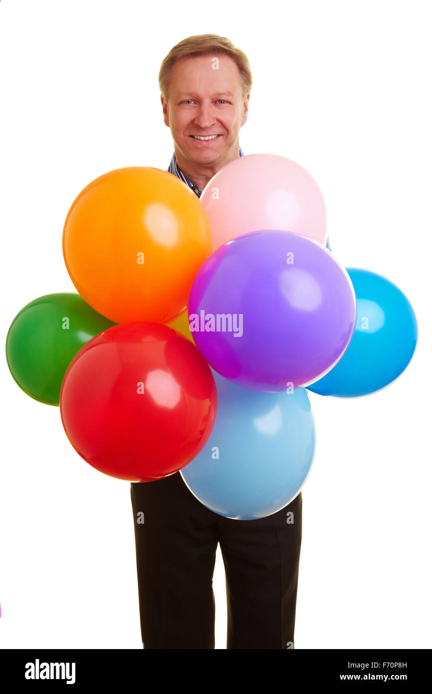 Happy elderly man with colorful balloons celebrating his birthday Stock ...
