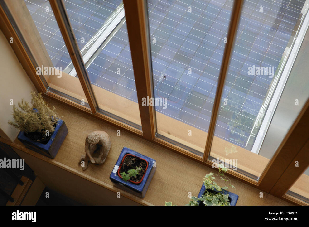 Photo Voltaic ( PV ) Solar Panels on conservatory roof of Eco House at ...