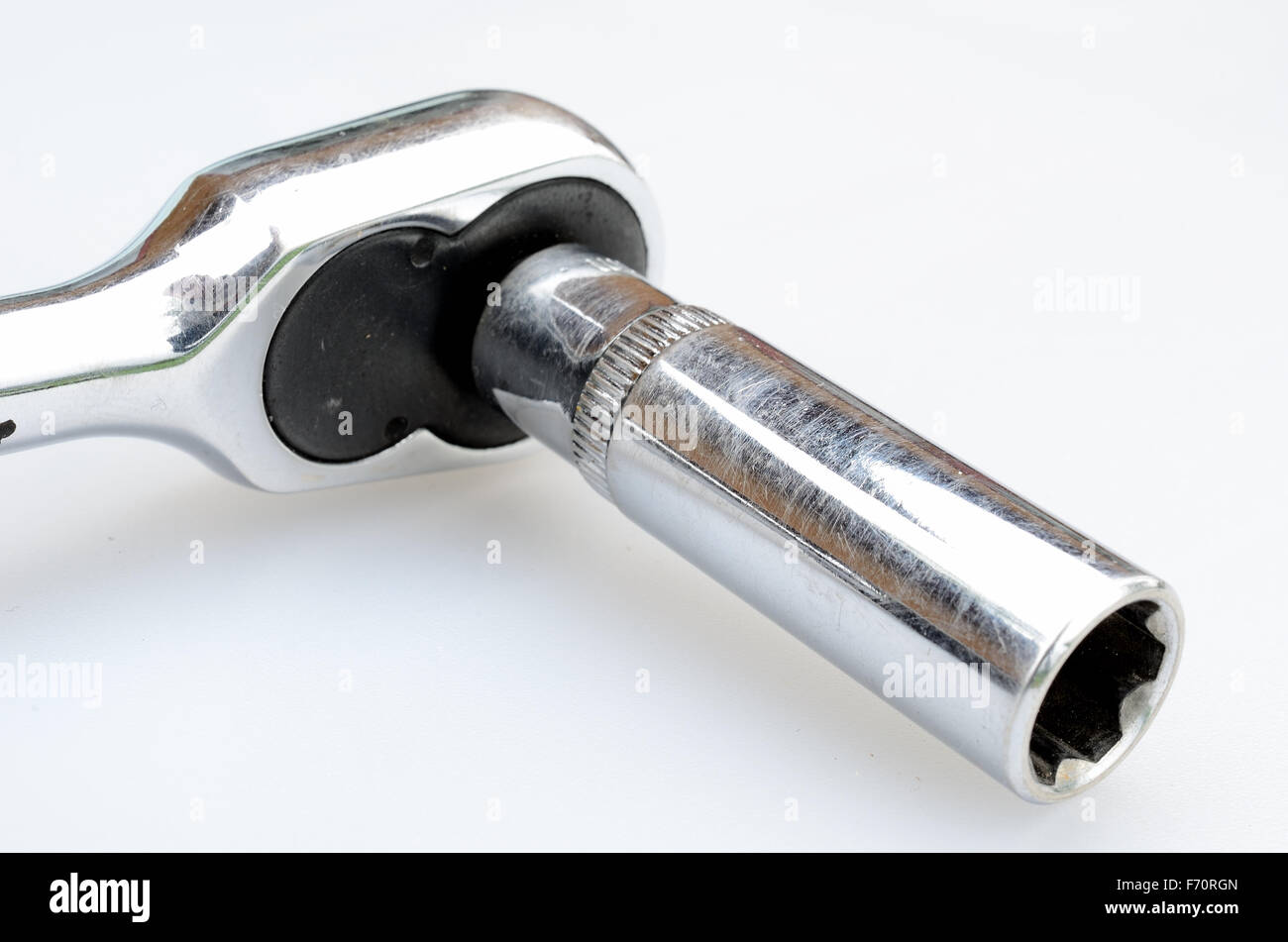Socket wrench with socket isolated on white background Stock Photo - Alamy