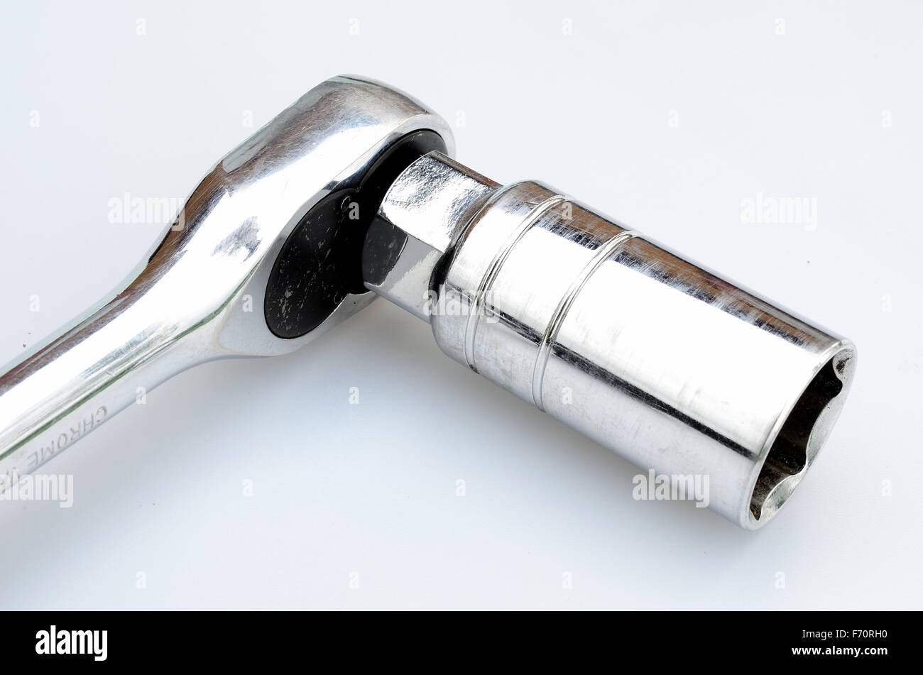Socket wrench with socket isolated on white background Stock Photo - Alamy