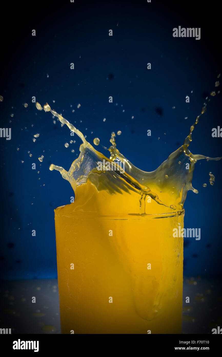 Orange fruit juice splash Stock Photo - Alamy