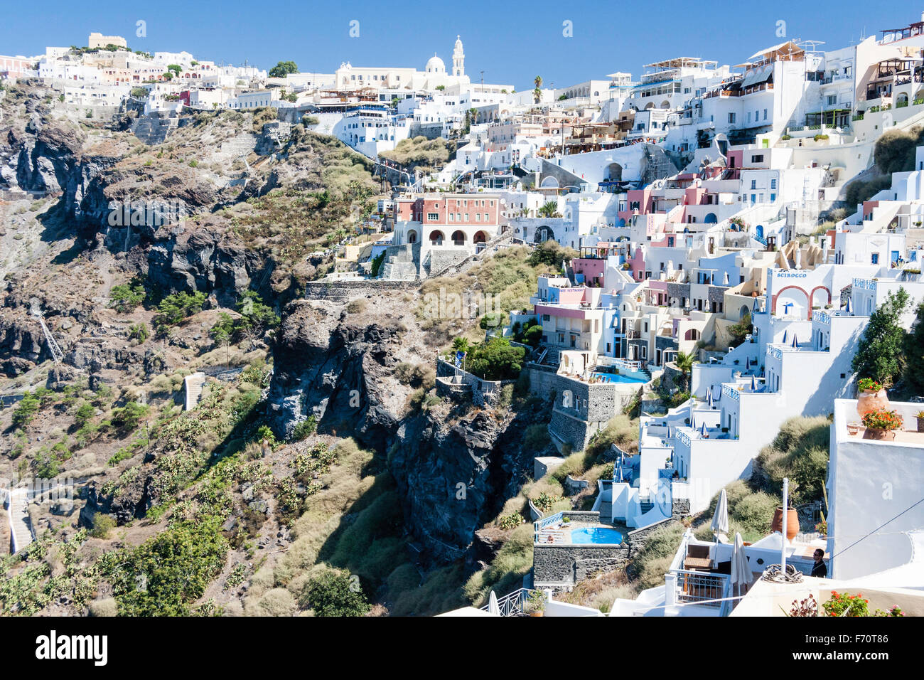 Santorini, Fira. View along with settlement built on clifftop terraces ...