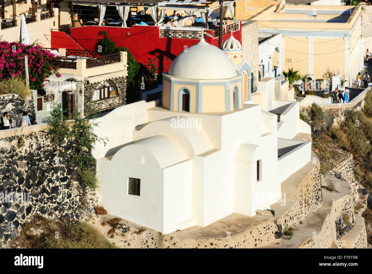 Santorini. White washed Greek orthodox church built on terrace on edge ...