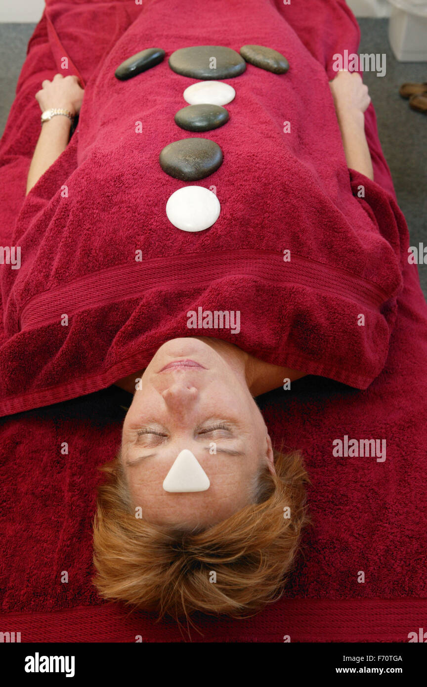 Patient having La Stone Therapy Stock Photo - Alamy