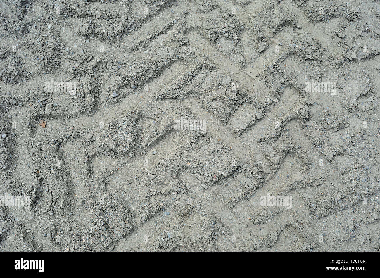 texture and tracks in grey sand Stock Photo - Alamy