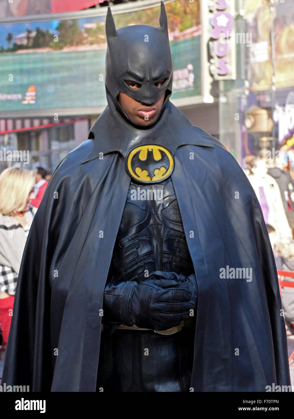 An African American man dressed as Batman in Times Square soliciting ...
