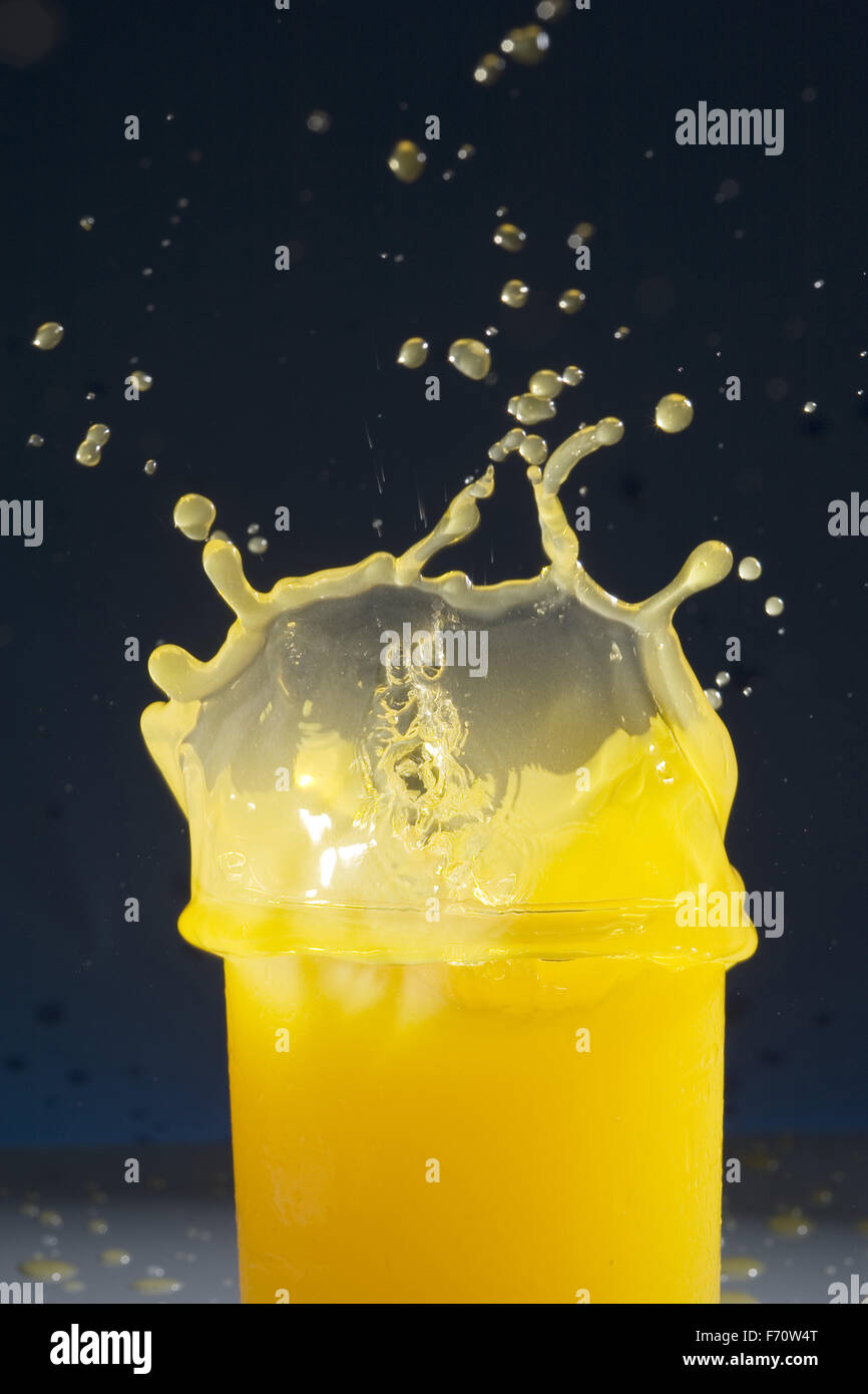 Orange fruit juice splash Stock Photo - Alamy