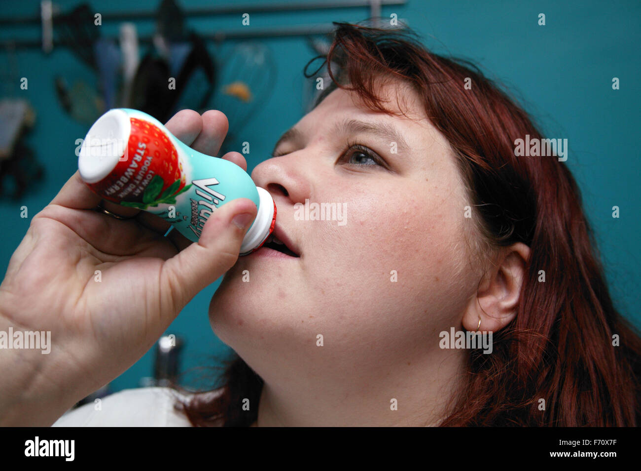 Woman drinking a healthy bacteria drink Stock Photo - Alamy