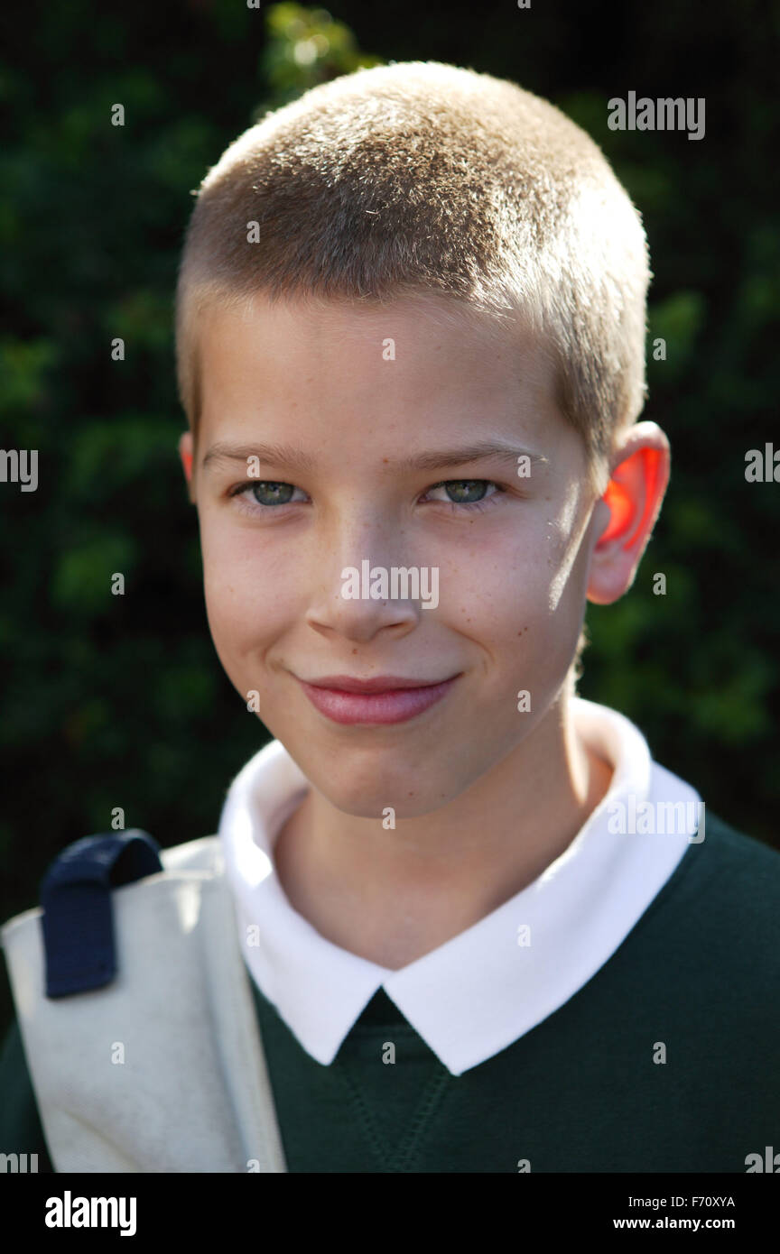 Portrait of boy in school uniform Stock Photo - Alamy
