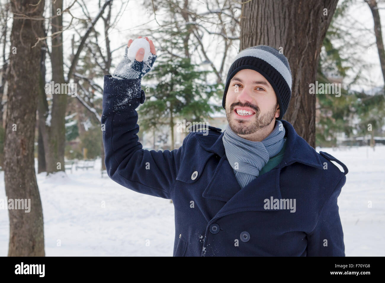 Man throwing a snowball hi-res stock photography and images - Alamy