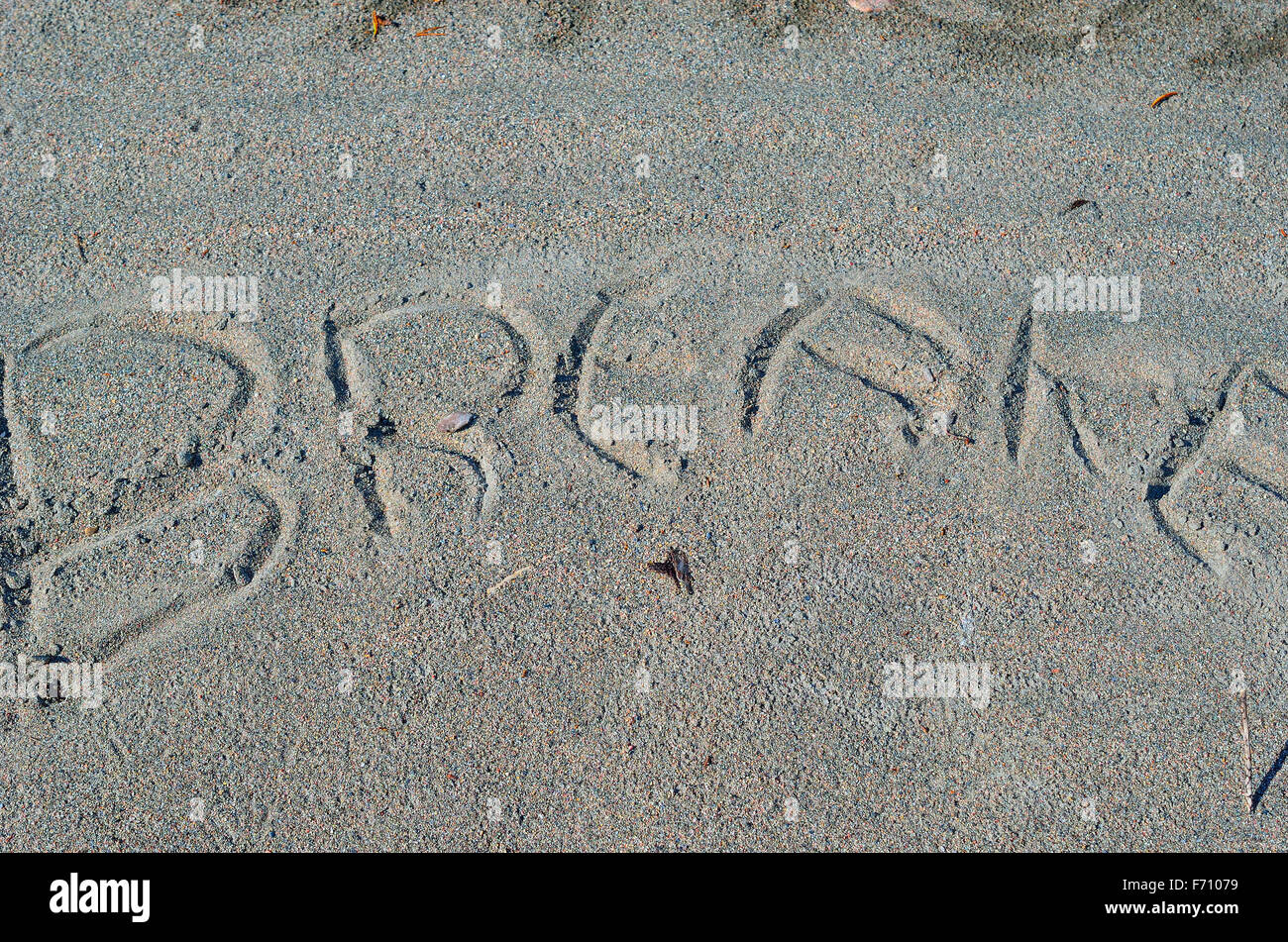 break written in hot sand in summer Stock Photo - Alamy