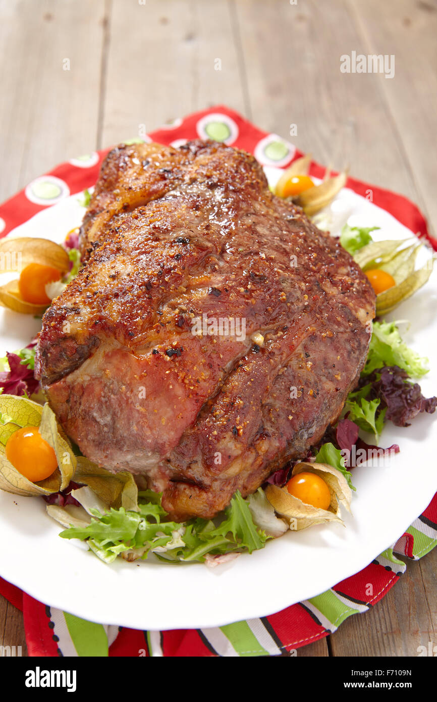 Roasted pork neck with garlic and black pepper Stock Photo - Alamy