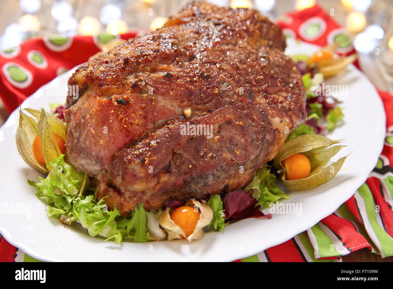 Roasted pork neck with garlic and black pepper Stock Photo - Alamy
