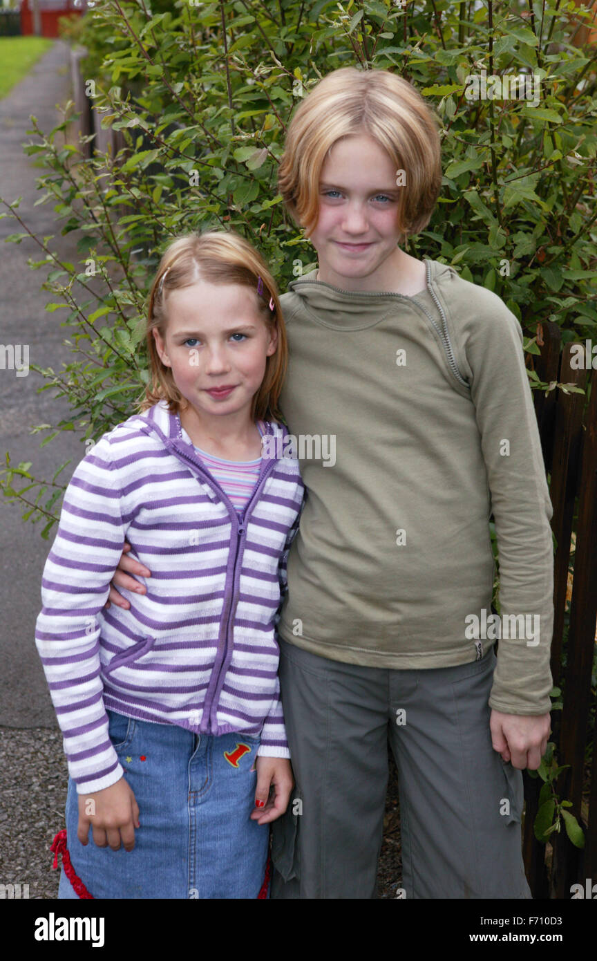 Two sisters standing outside hi-res stock photography and images - Alamy